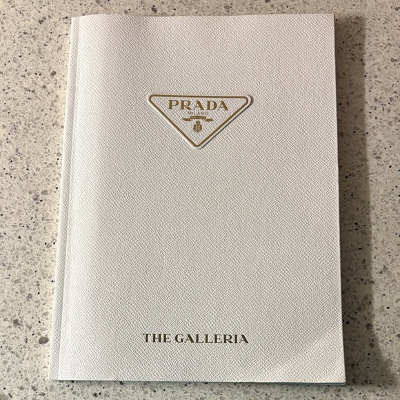 Prada | Accents | Prada The Galleria Cream Magazine With Gold Logo ...